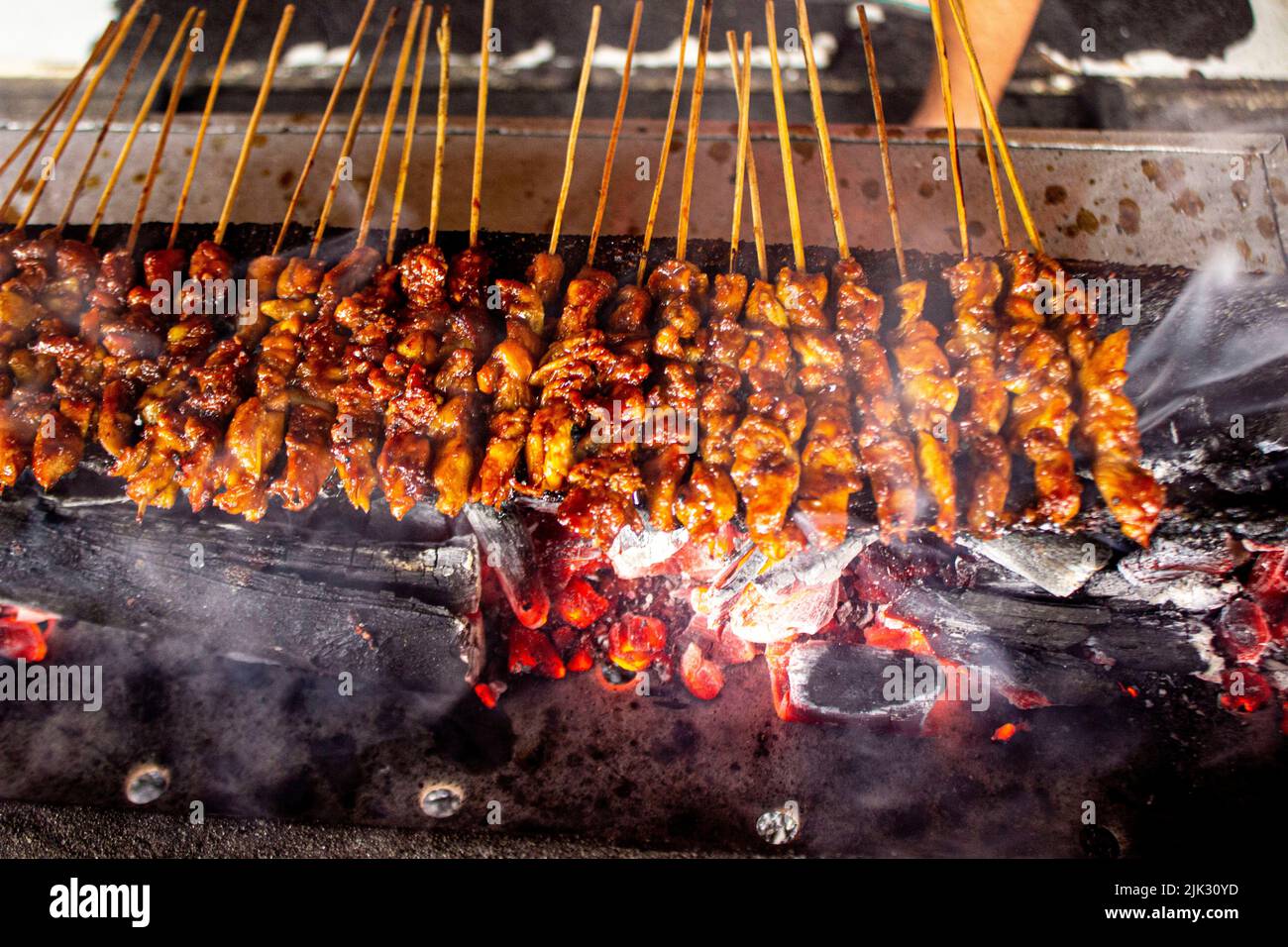 sate ayam or chicken satay , or chicken or meat satay with charcoal ...