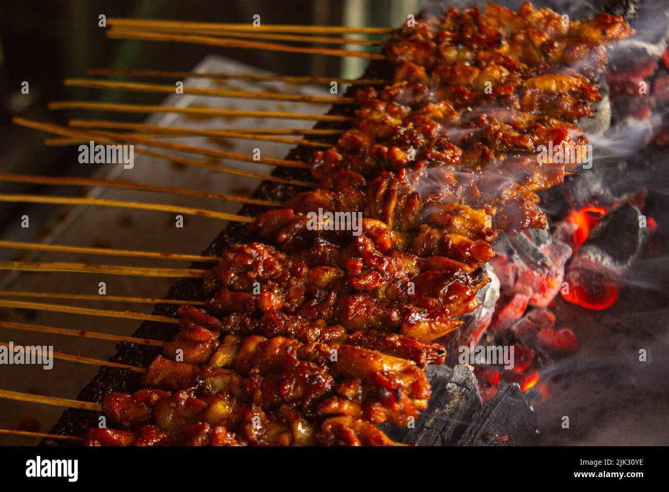 sate ayam or chicken satay , or chicken or meat satay with charcoal ...