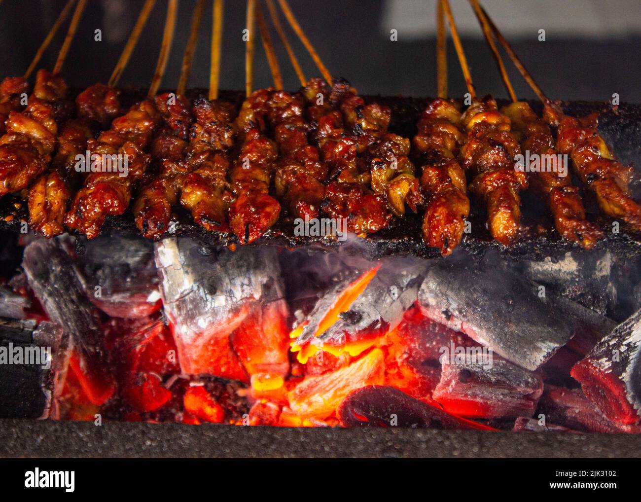 sate ayam or chicken satay , or chicken or meat satay with charcoal ...