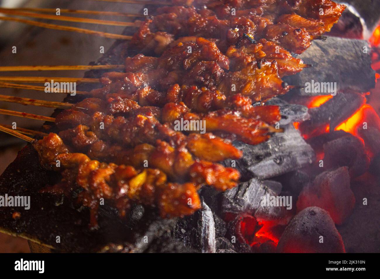 sate ayam or chicken satay , or chicken or meat satay with charcoal ...