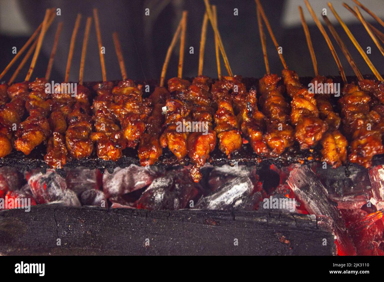 sate ayam or chicken satay , or chicken or meat satay with charcoal ...