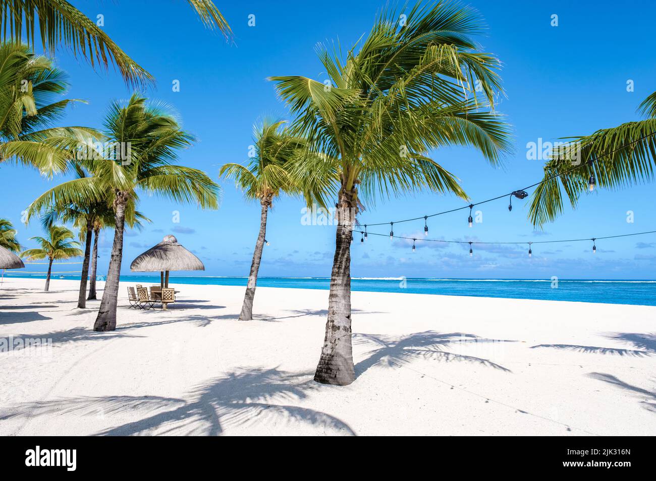 Tropical beach with white sand and palm trees Le Morne Mauritius, white ...