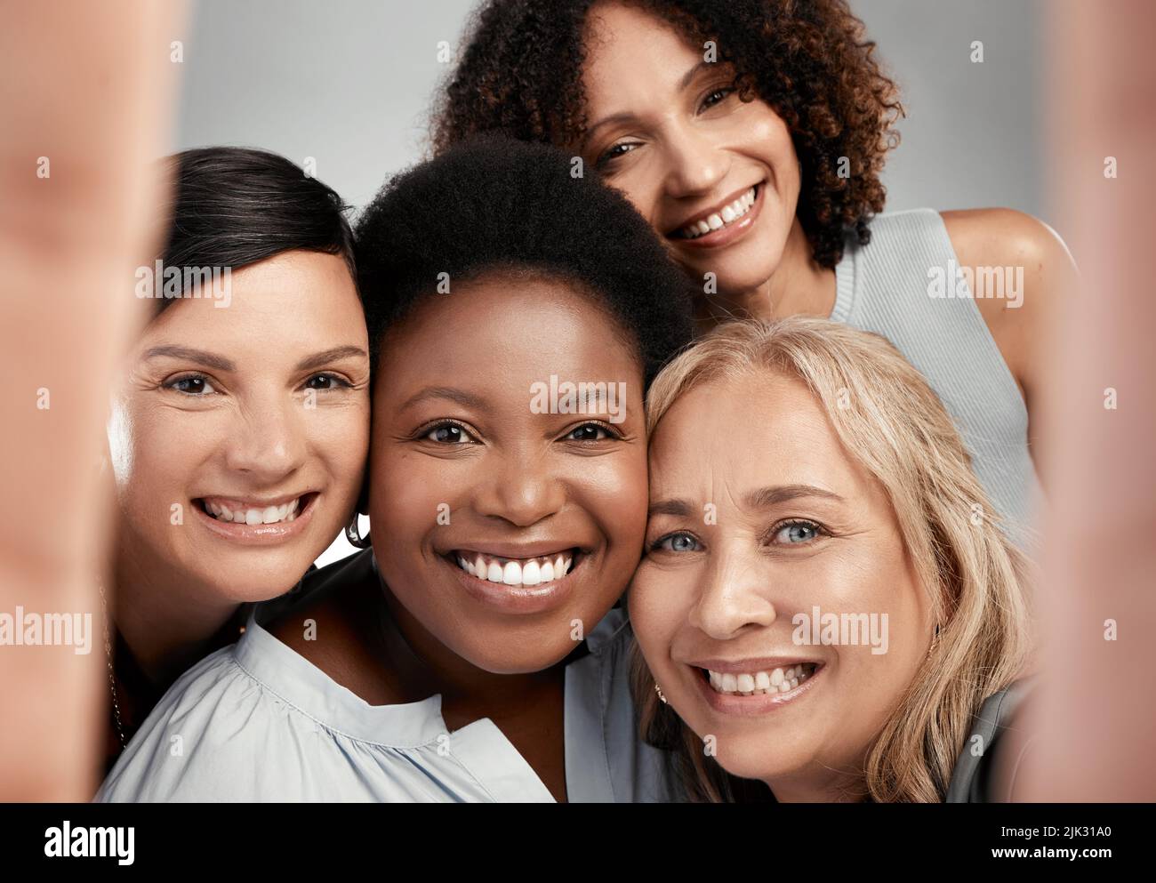 Capturing the best moments together. a diverse group of women standing ...