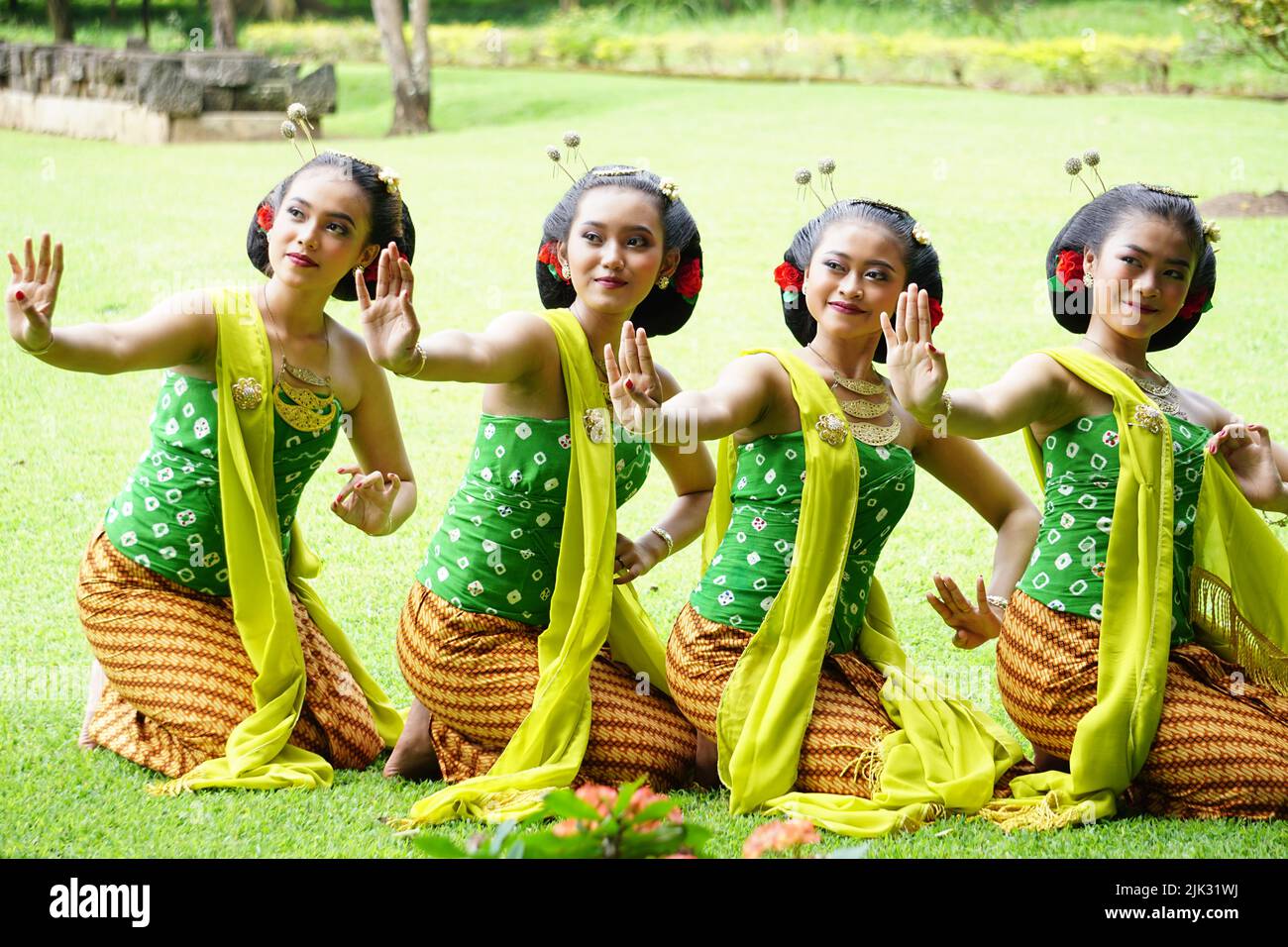 Indonesian traditional dancers with traditional clothes which are ...