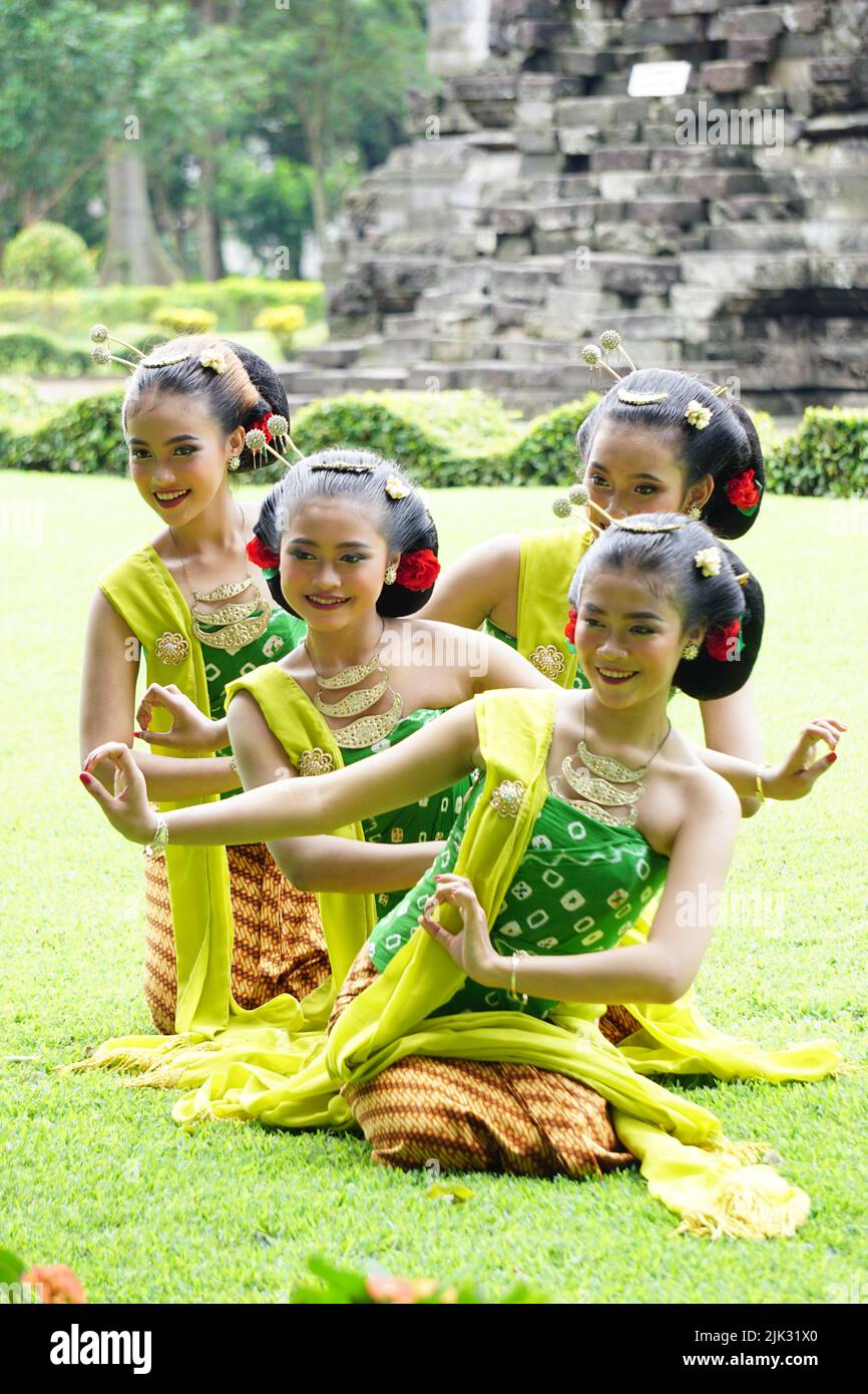 Indonesian traditional dancers with traditional clothes which are ...