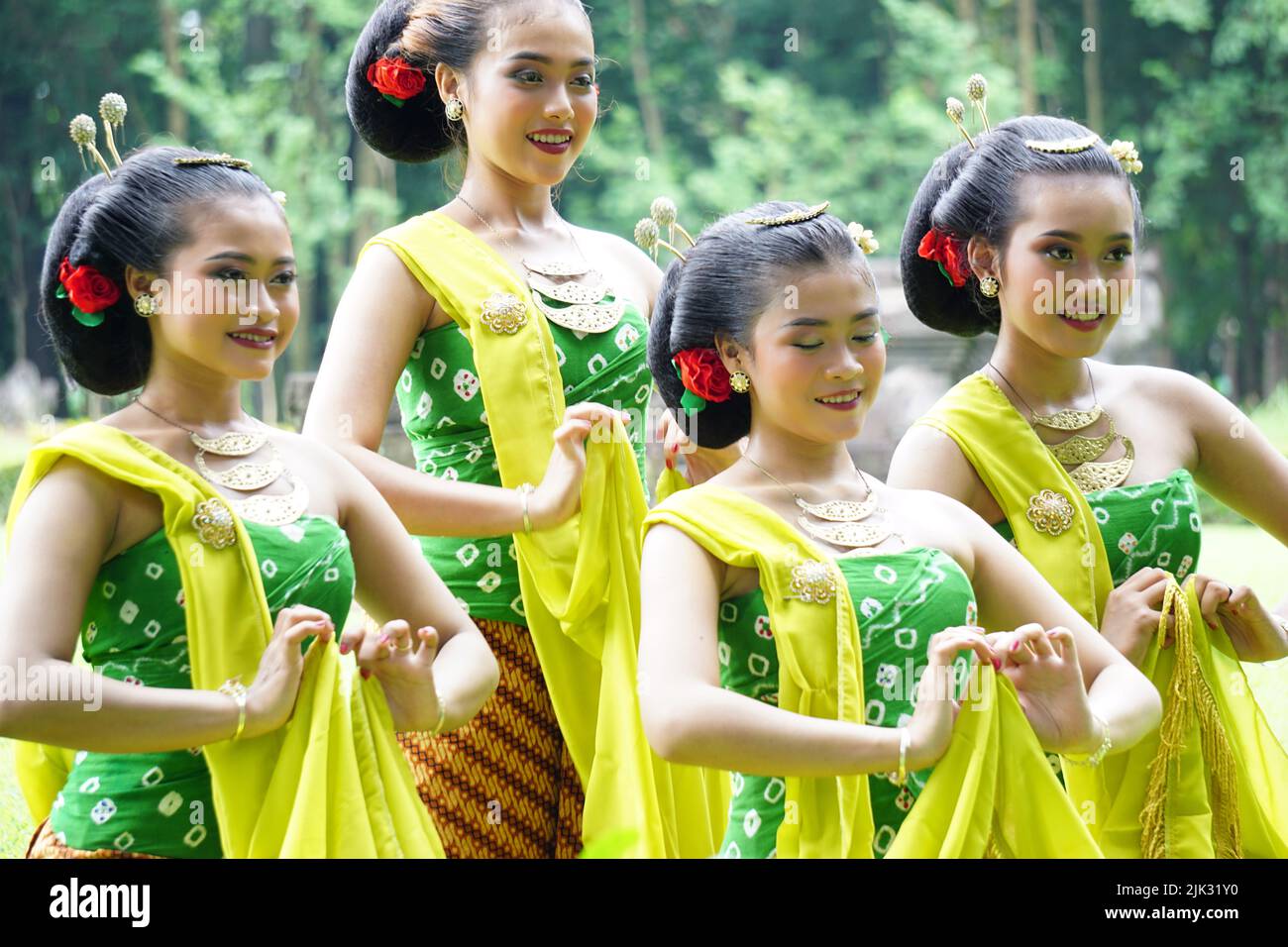 Indonesian traditional dancers with traditional clothes which are ...