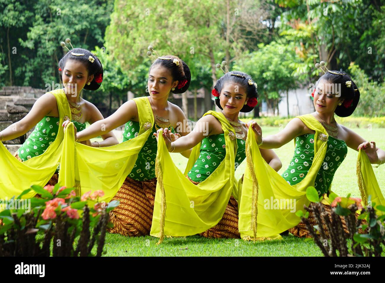 Indonesian traditional dancers with traditional clothes which are ...