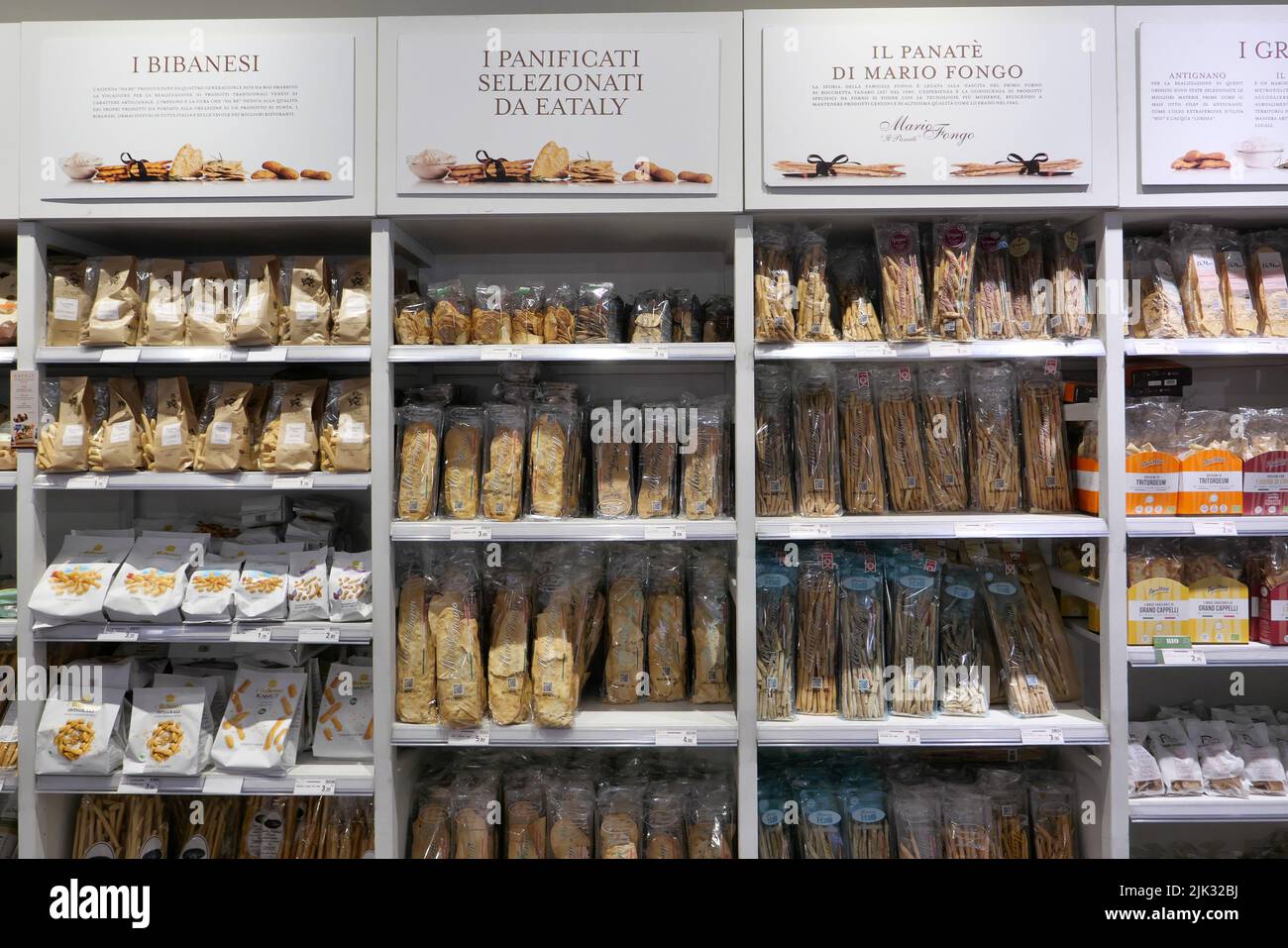 VARIOUS TYPES OF BREAD ON A SHELF INSIDE THE EATALY FOOD STORE Stock ...