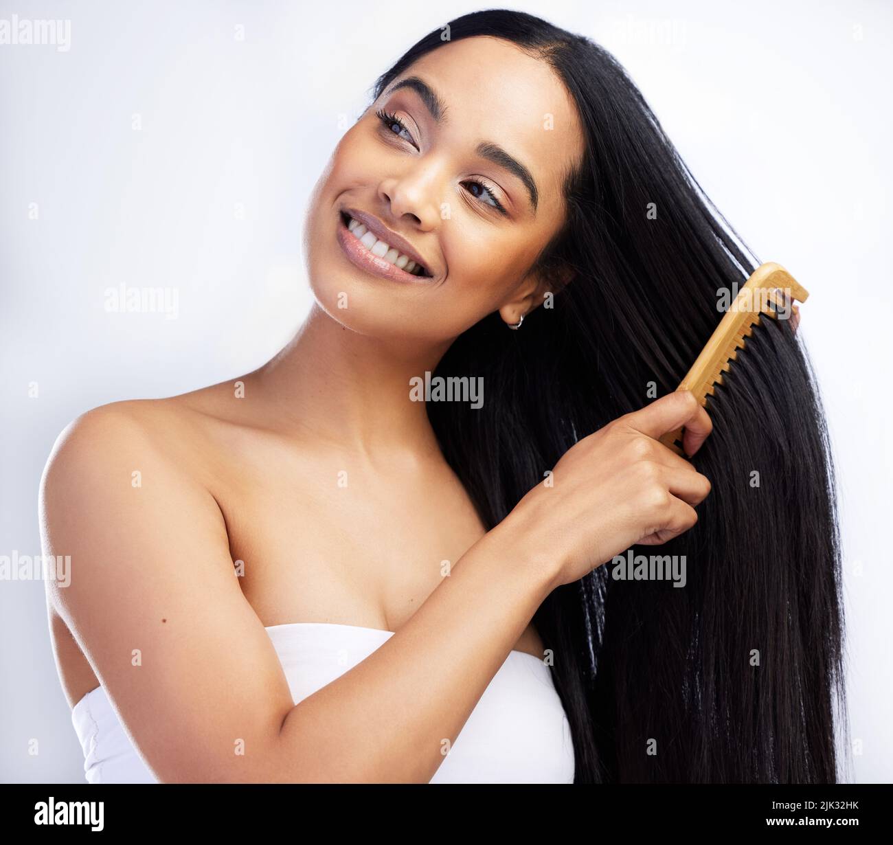 Brushing hair out of face hi-res stock photography and images - Alamy