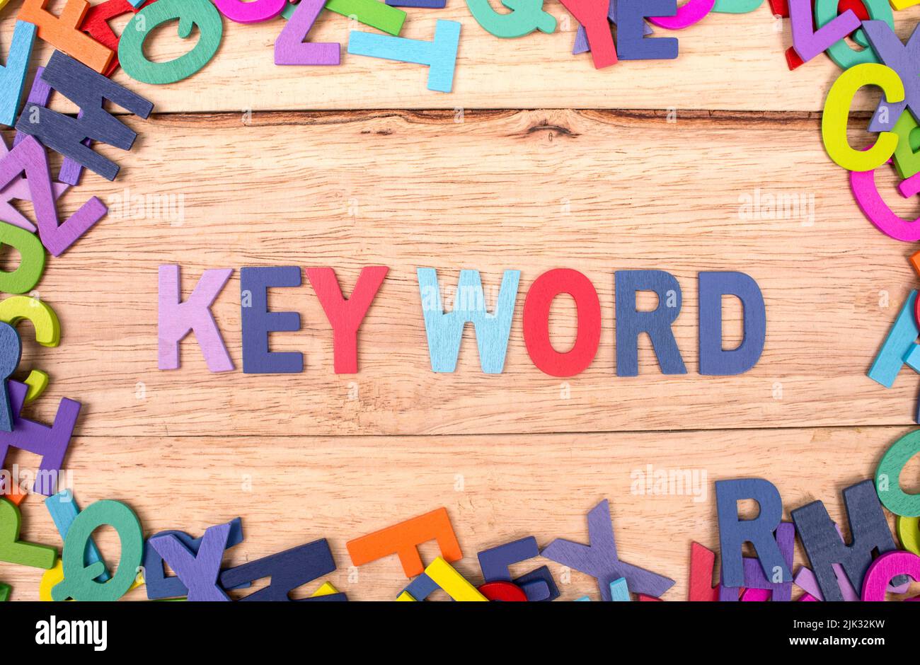 colorful wooden letter of the alphabet and the word Key word isolated ...