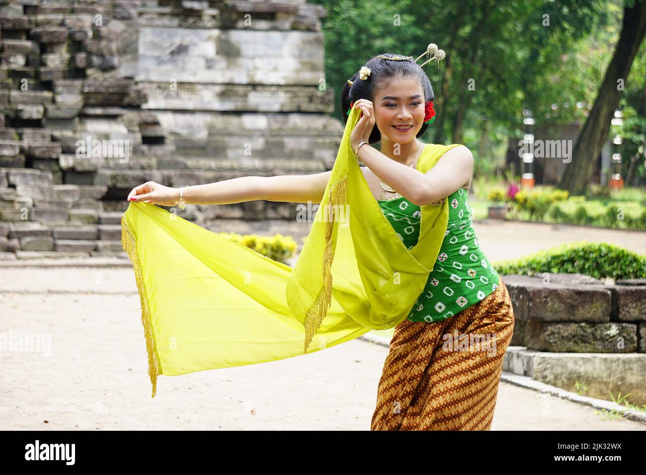 Indonesian traditional dancers with traditional clothes which are ...