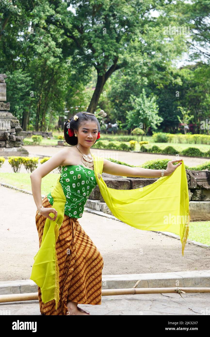 Indonesian traditional dancers with traditional clothes which are ...