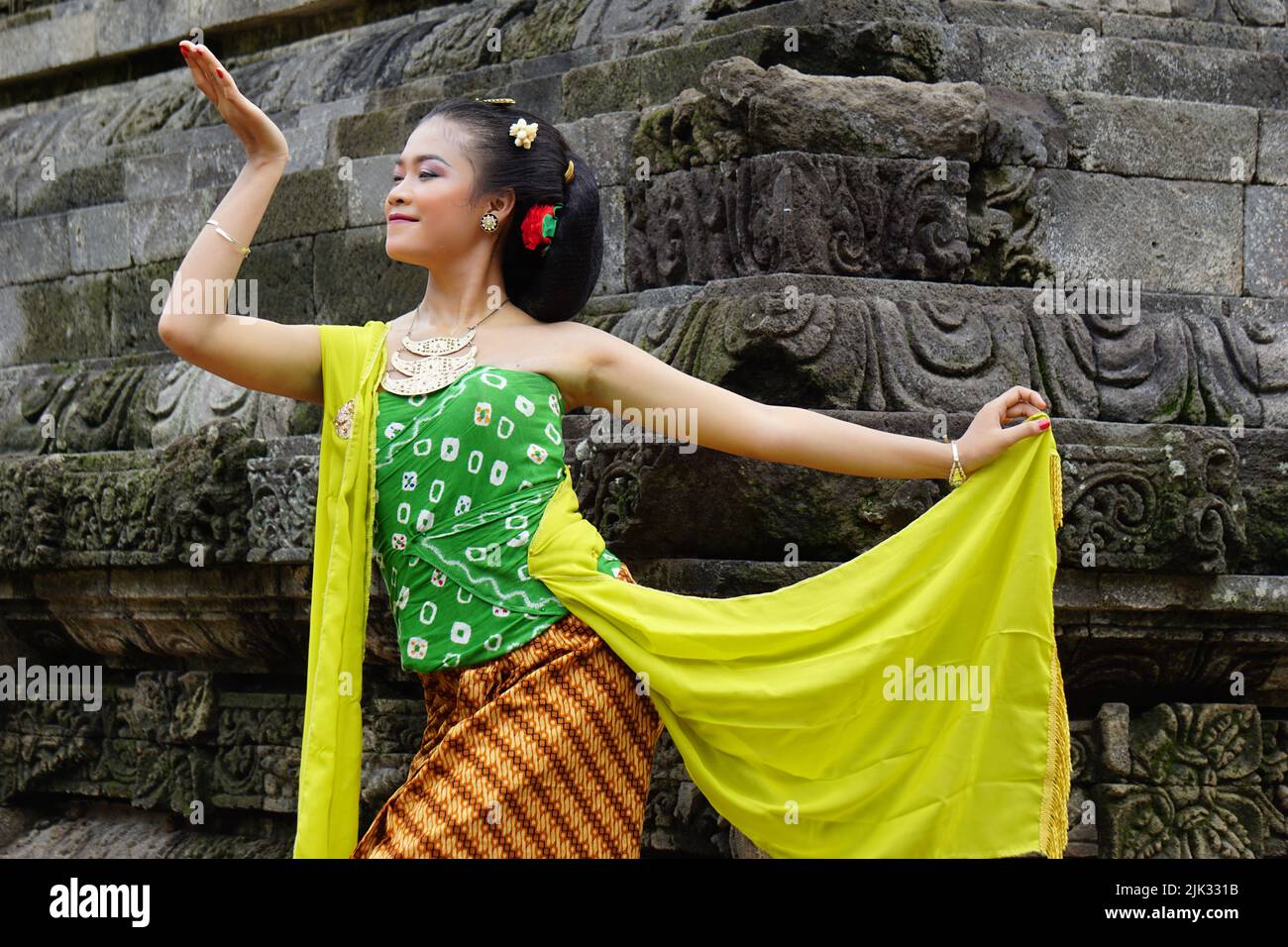 Indonesian traditional dancers with traditional clothes which are ...