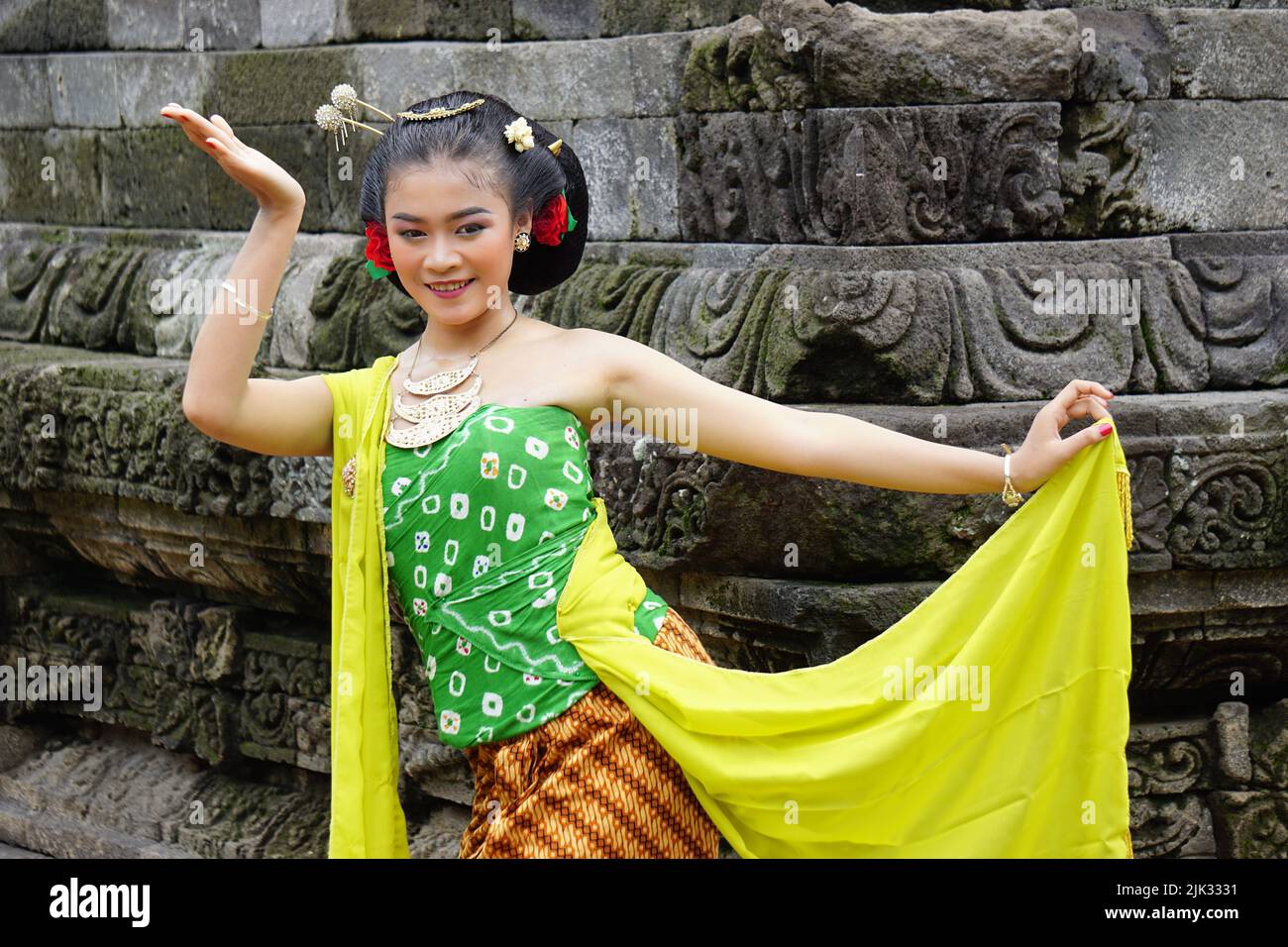 Indonesian traditional dancers with traditional clothes which are ...