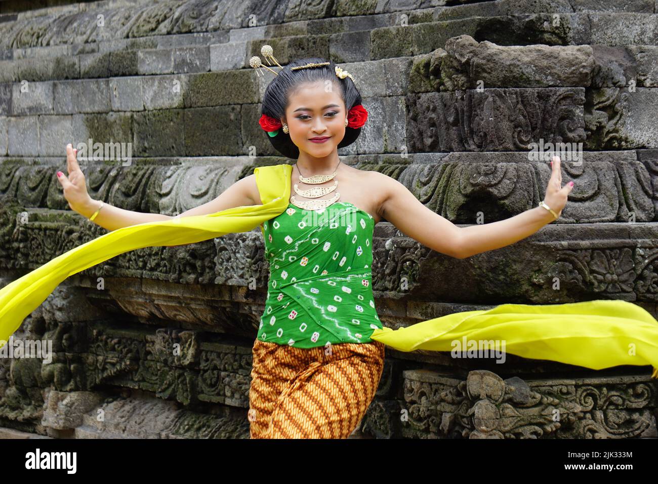 Indonesian traditional dancers with traditional clothes which are ...