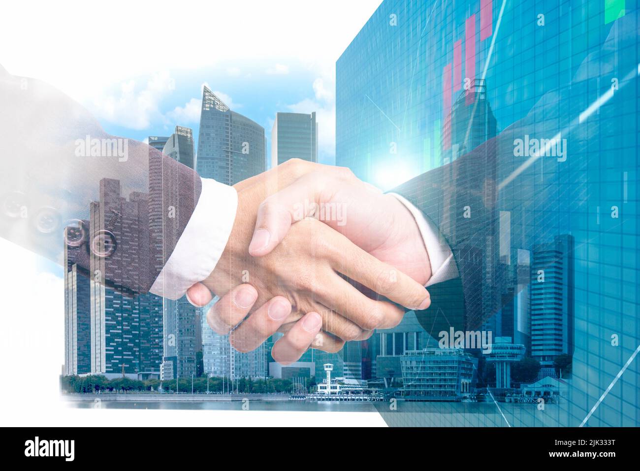 Double exposure of business partner handshake and Display stock market ...