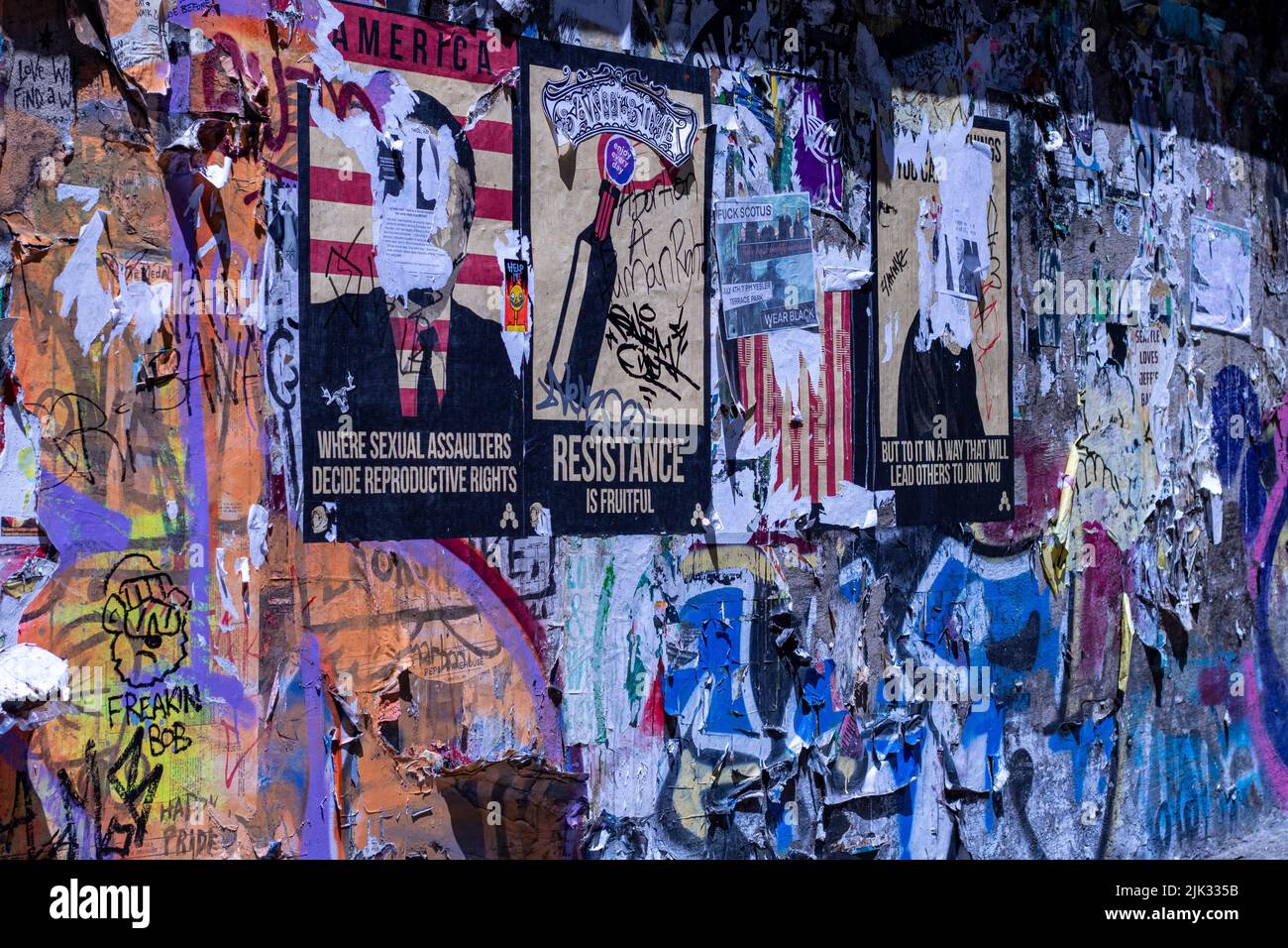 street wall with posters and graffitis at the pike place market Stock ...