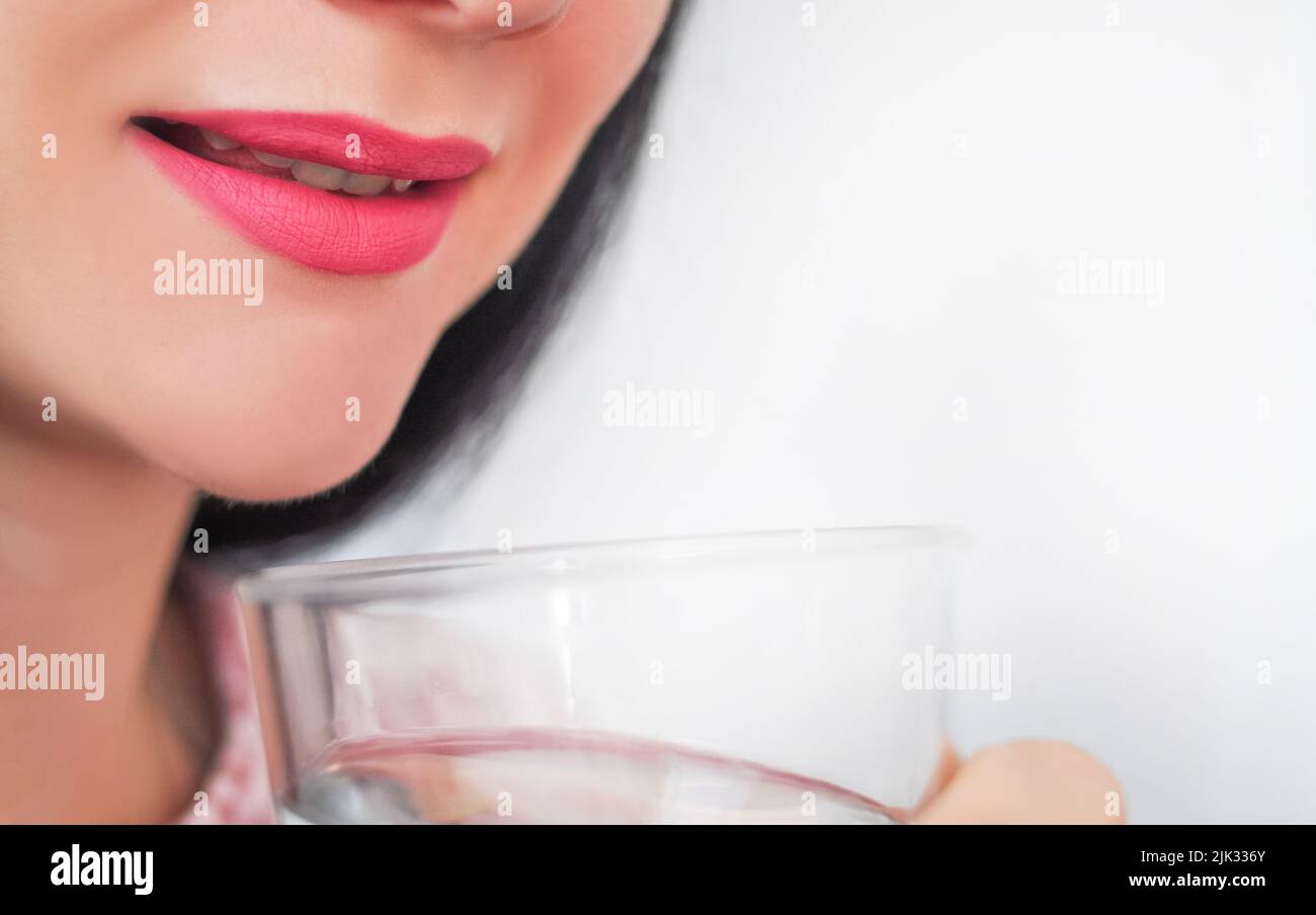 Woman drinking water from purified hi-res stock photography and images ...