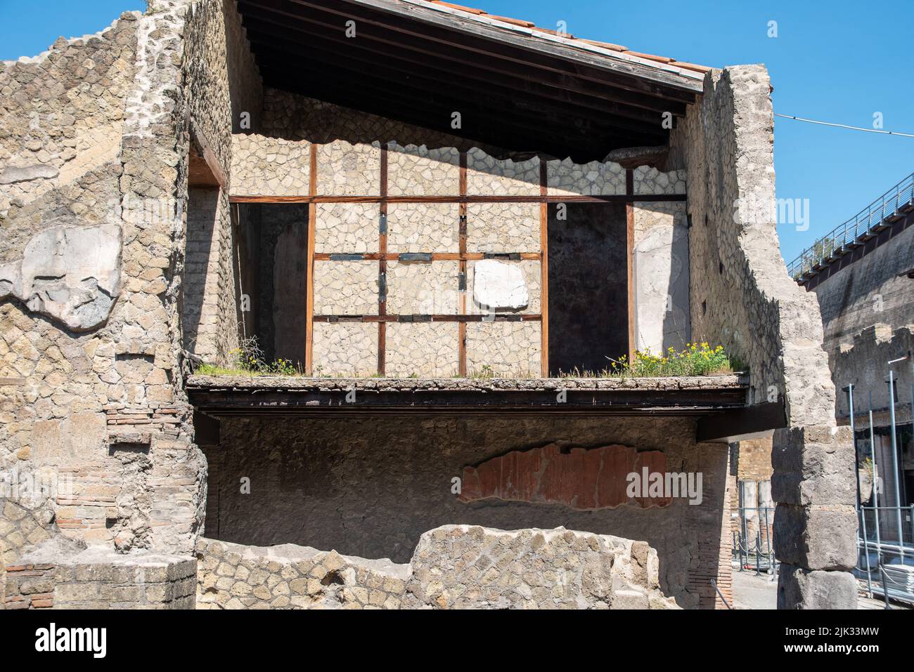 The half ruined Trellis house in the ancient Roman city of Herculaneum ...