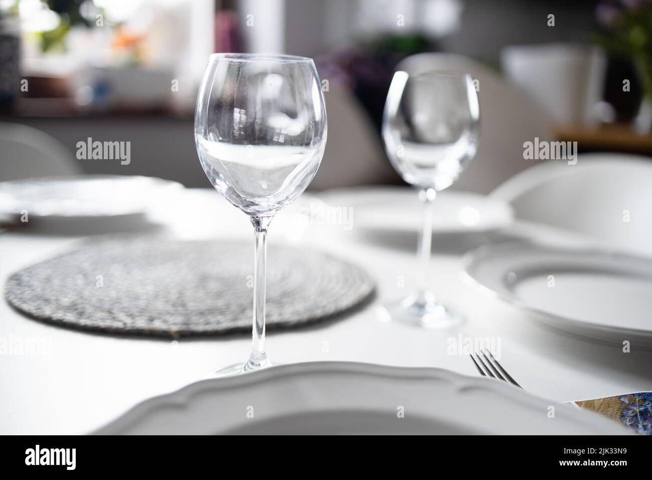 Table served for dinner in living room, close up view Stock Photo - Alamy