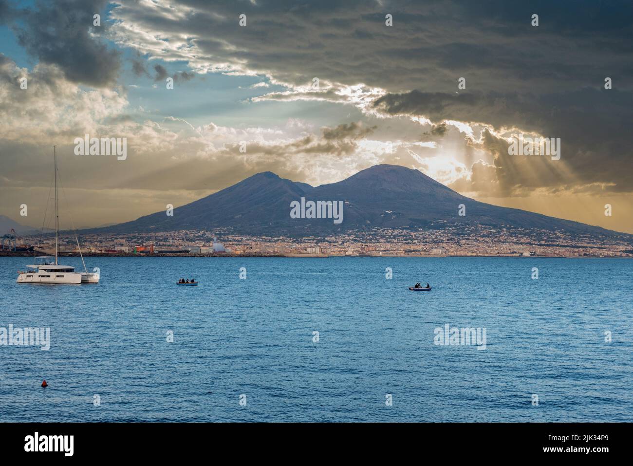 Scenic sunbeams after rain at Mount Vesuvius and the Gulf of Naples ...