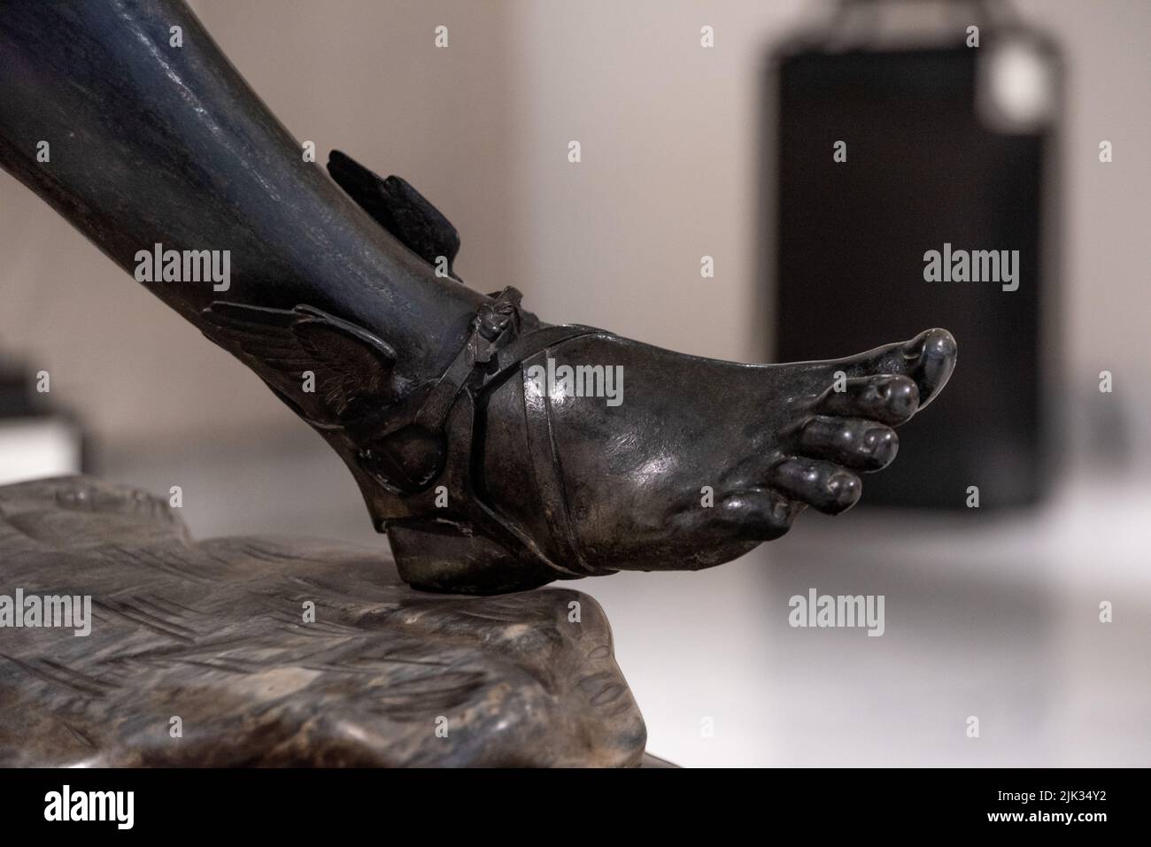 NAPLES, ITALY - MAY 06, 2022 - Foot of a ancient Roman Hermes statue ...