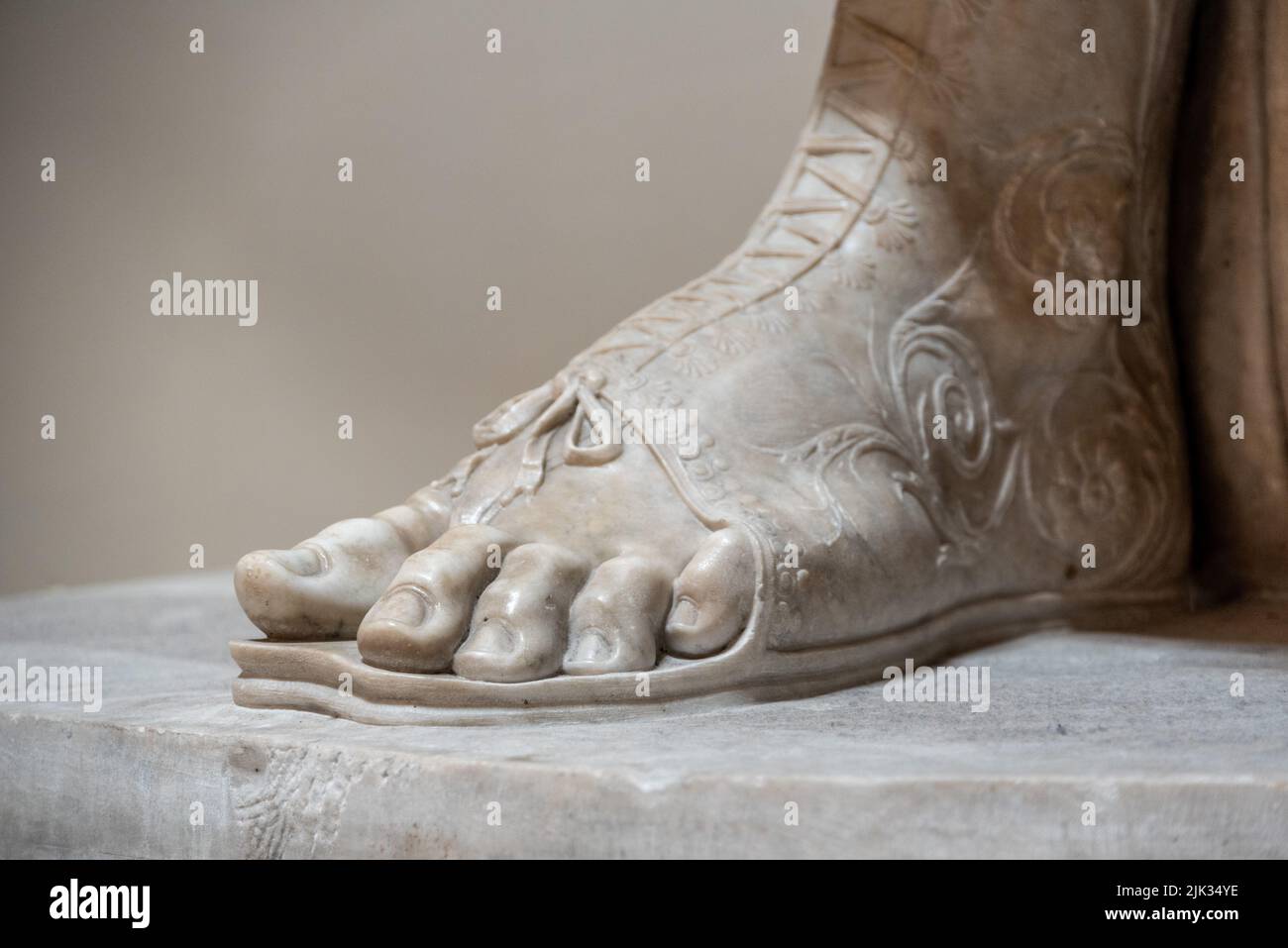 NAPLES, ITALY - MAY 06, 2022 - Foot of an ancient Roman scuplture ...