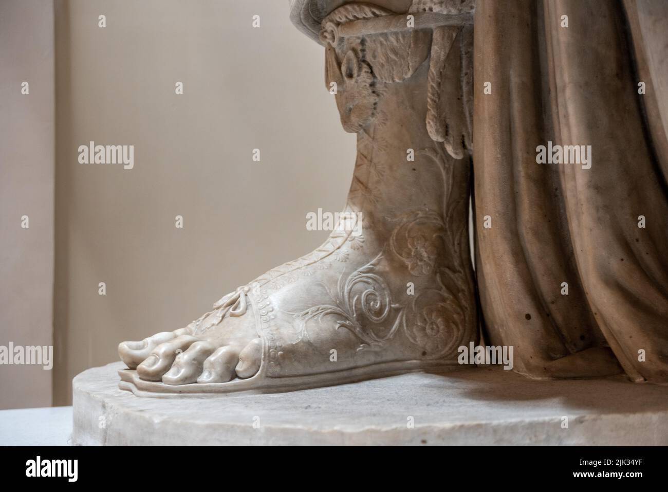 NAPLES, ITALY - MAY 06, 2022 - Foot of an ancient Roman scuplture ...
