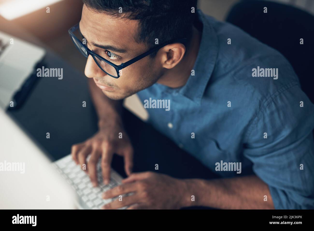 I might bend a little but I dont fold. a young using a computer in a ...