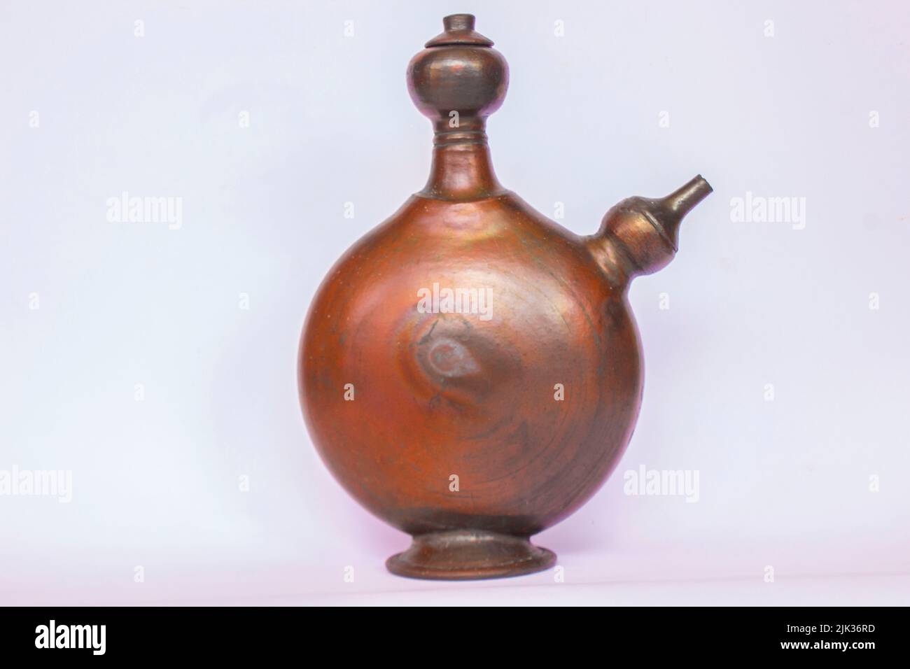 kendi or jug isolated on white background. kendi is traditional jug ...