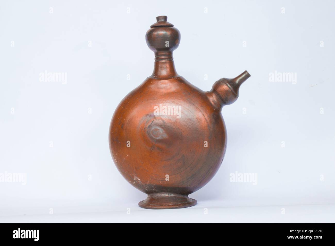 kendi or jug isolated on white background. kendi is traditional jug ...