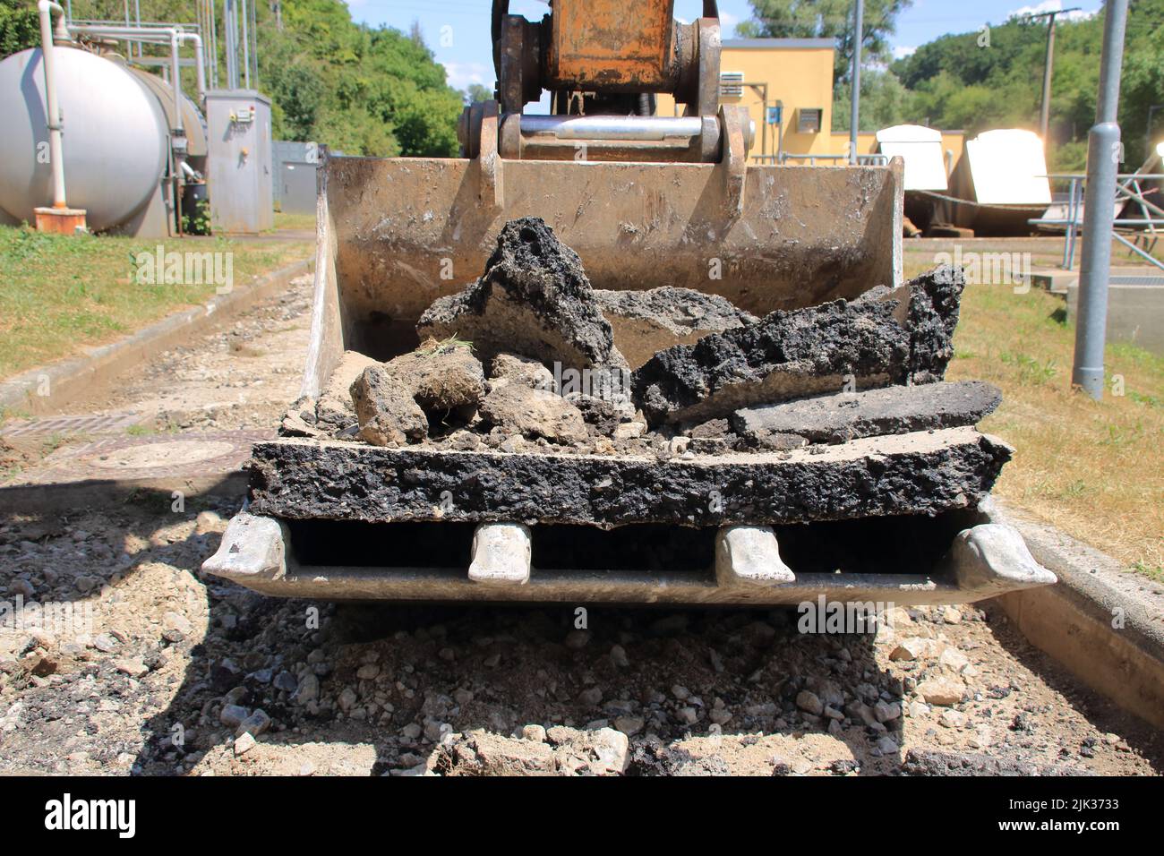 Disposal waste transport with an excavator hi-res stock photography and ...