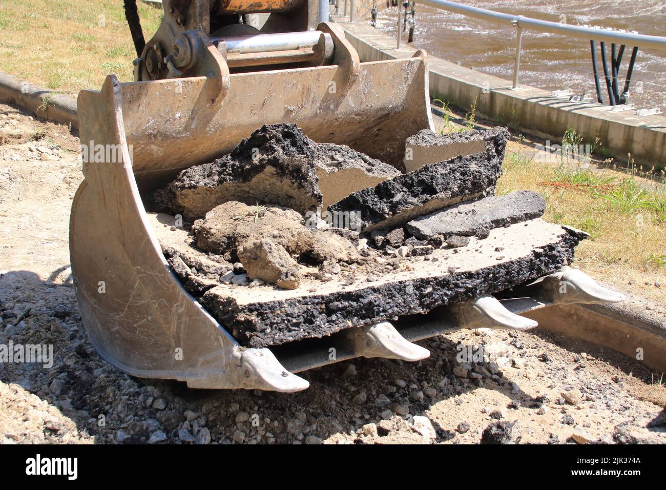 Disposal waste transport with an excavator hi-res stock photography and ...