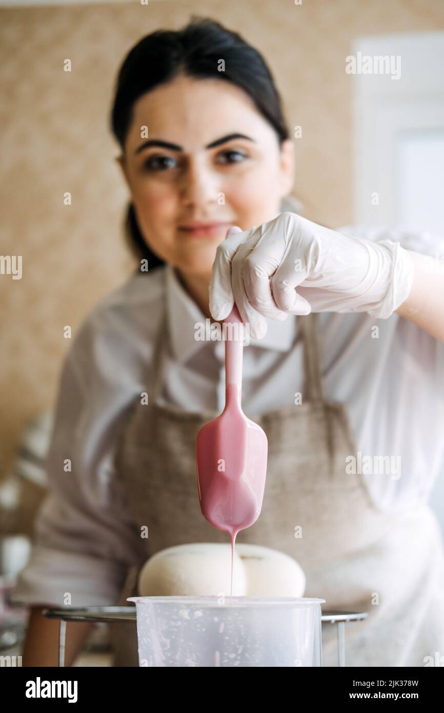 Confectioner small business, Arabic confectioner chef make heart shape ...