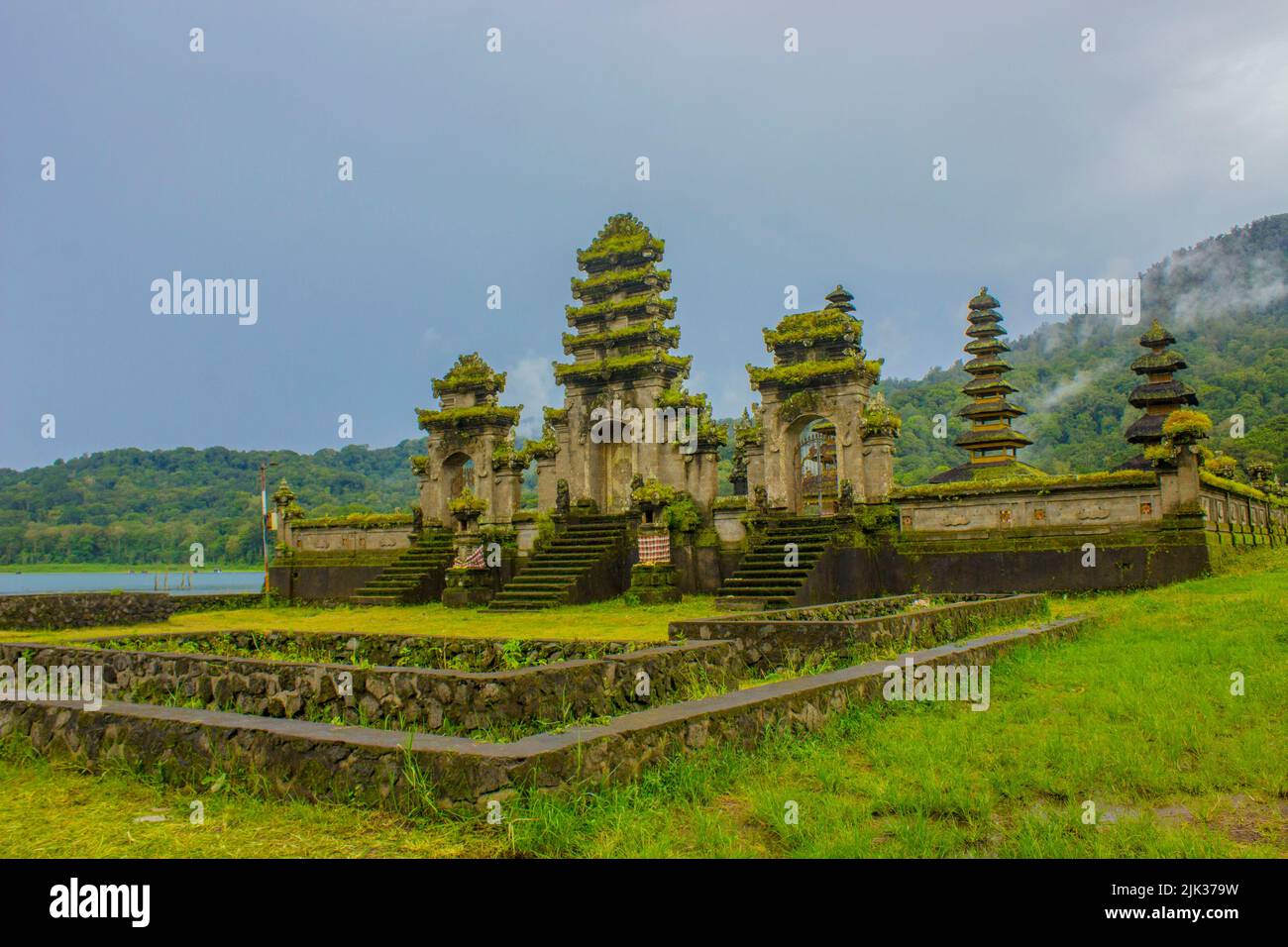 hindu temple ruins of Pura Hulun Danu at the Tamblingan lake, Bali ...