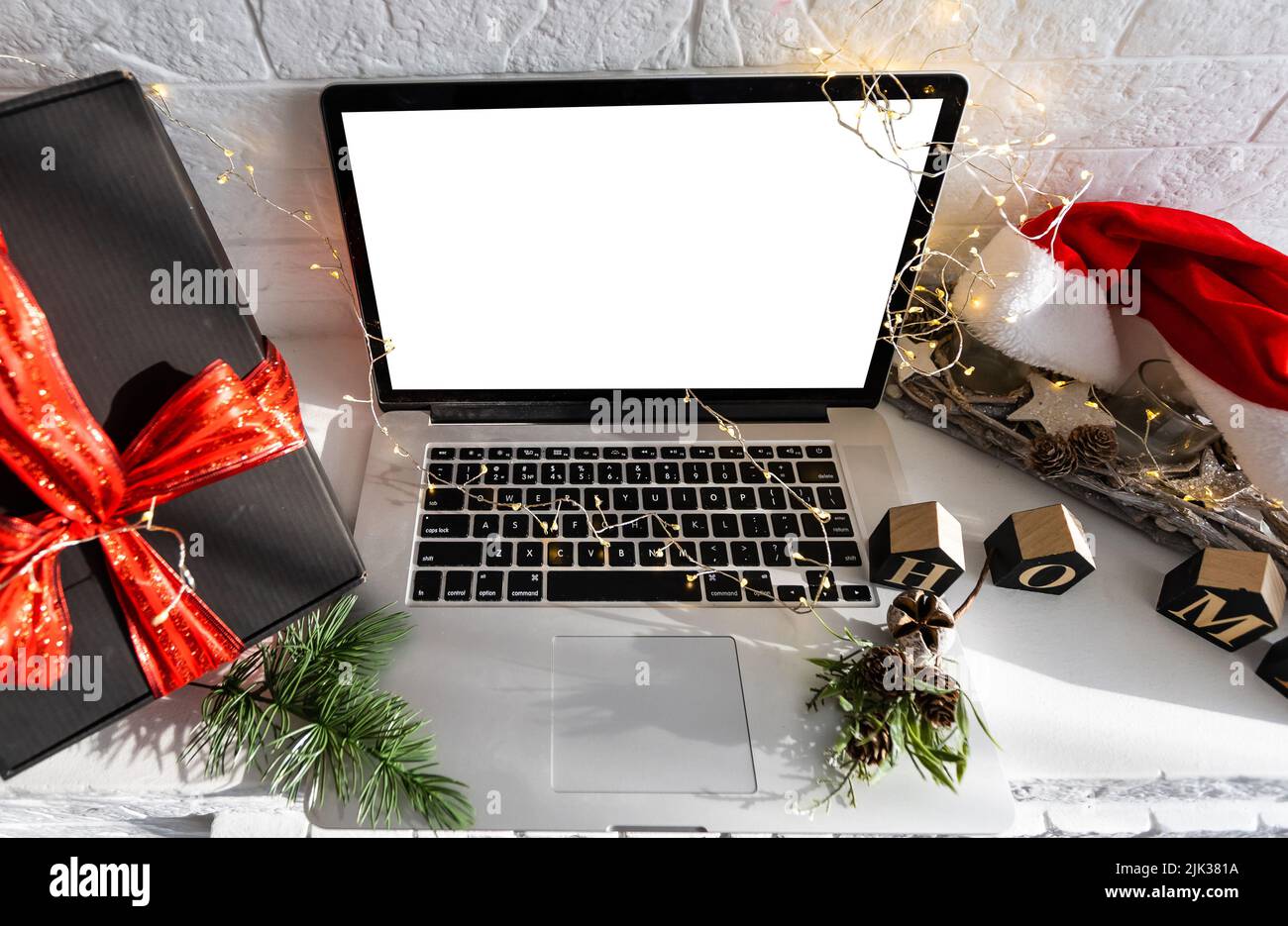 Laptop computer with white blank empty mock up screen on Merry ...