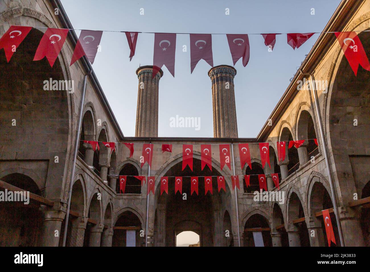 Cifte minareli (double minaret) old school inside with Turkish flags in ...