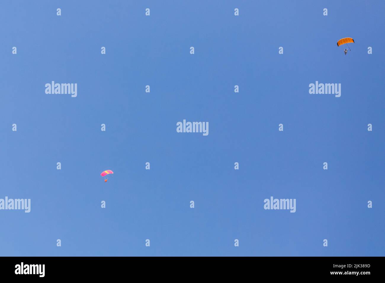 Skydiving. Tandem jump. An amazing adventure into the sky Stock Photo ...