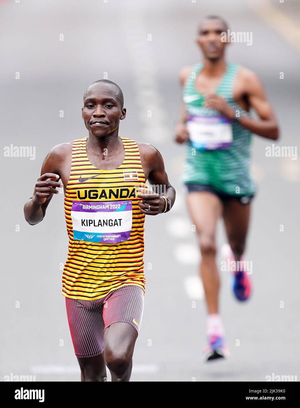 Uganda’s Victor Kiplangat leads from Tanzania's Alphonce Felix Simbu ...