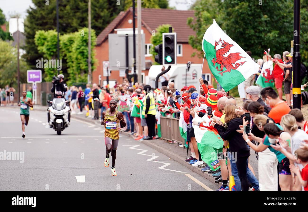 Uganda’s Victor Kiplangat leads from Tanzania's Alphonce Felix Simbu ...