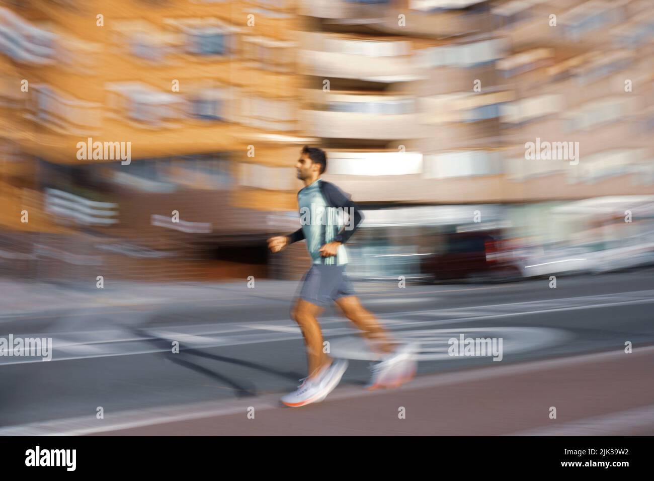 Man running fast on street hi-res stock photography and images - Alamy