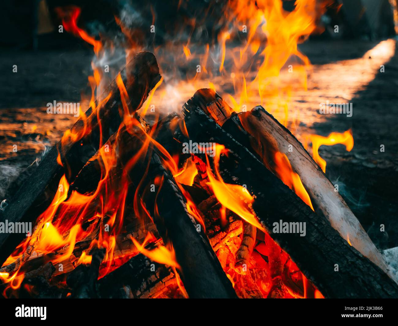 Burning campfire . Bonfire close up. Autumn relax camping mood. The firewood is red-hot Stock ...