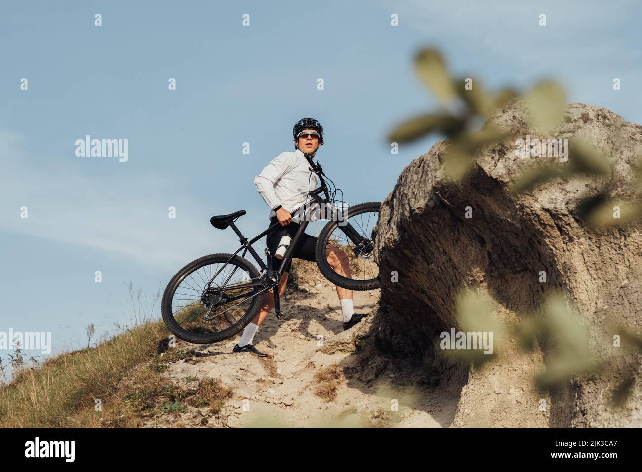 Professional Male Cyclist Carrying His Bike on Top of the Hill, Adult ...