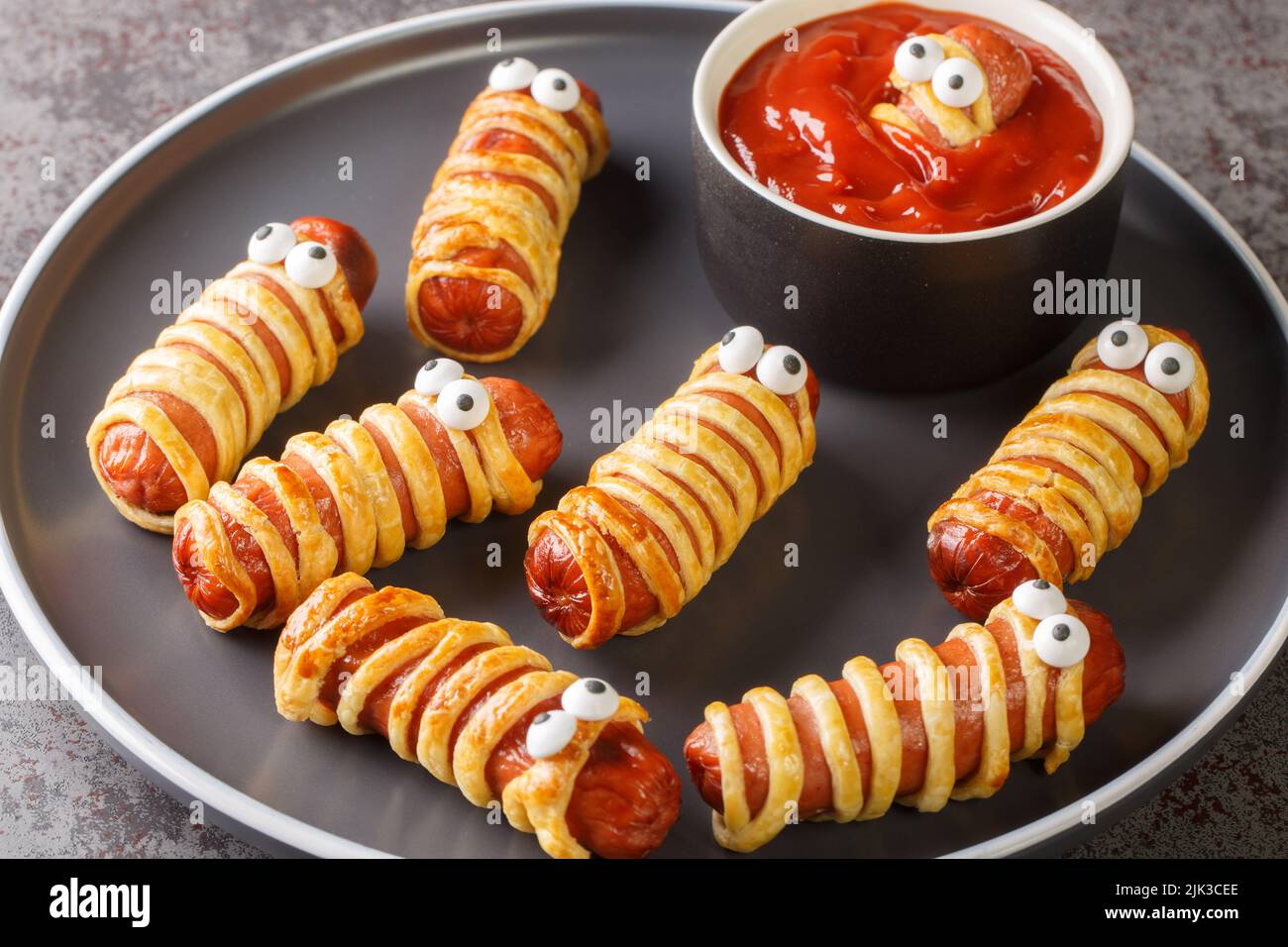 Homemade sausage mummies with ketchup Halloween funny food recipe ...