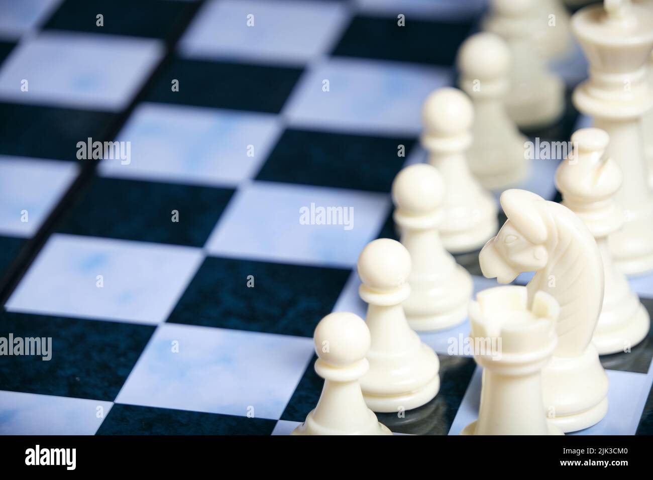 White chess pieces on a chessboard Stock Photo - Alamy