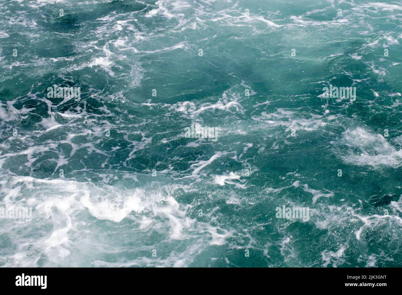 Sea surface. Turquoise sea water. Close up blue water surface at deep ...