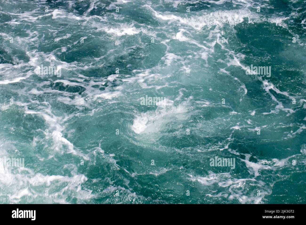 Sea surface. Turquoise sea water. Close up blue water surface at deep ...