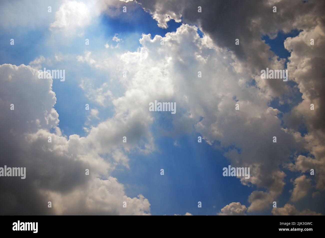 Aerial view landscape cloudscape of blue sky and beautiful clouds with ray lighting of sunlight ...