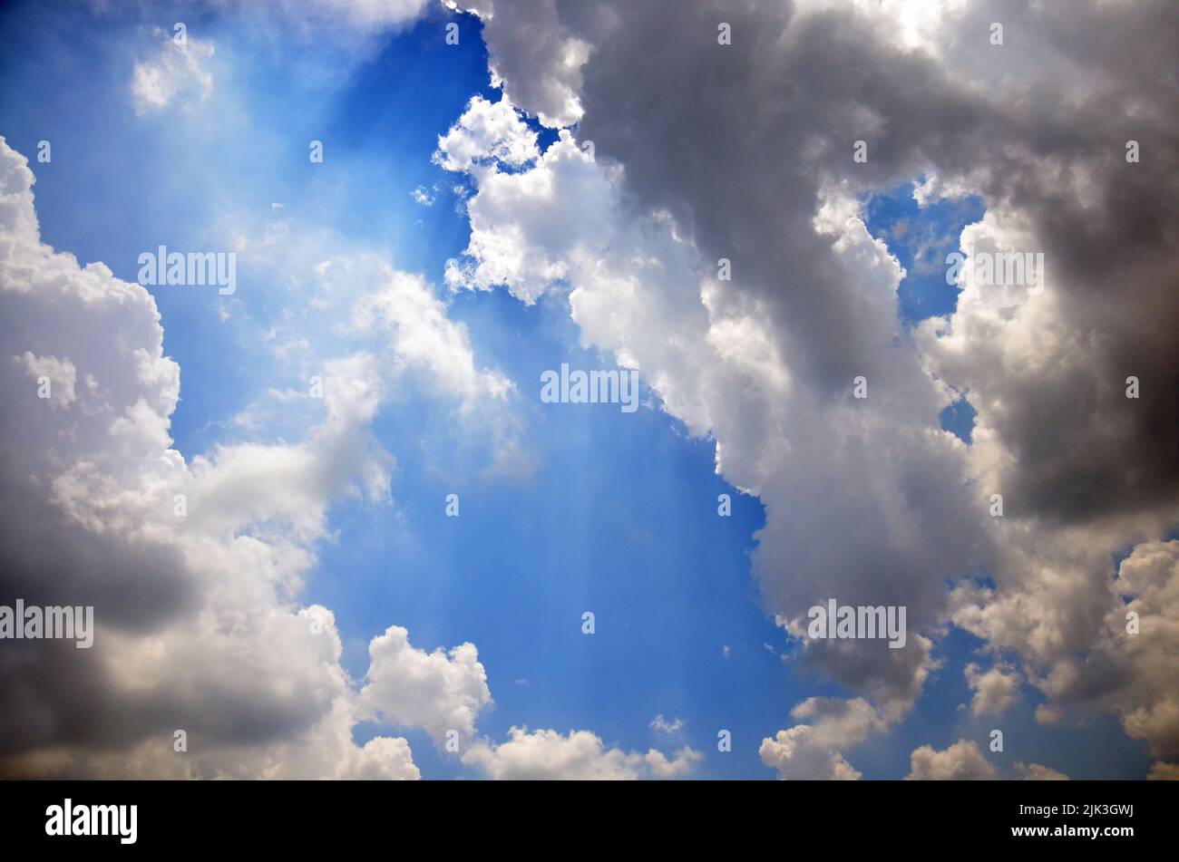 Aerial view landscape cloudscape of blue sky and beautiful clouds with ray lighting of sunlight ...