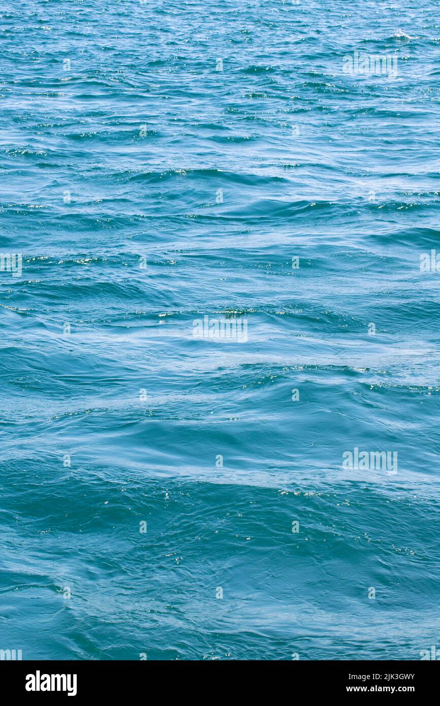 Sea surface. Turquoise sea water. Close up blue water surface at deep ...